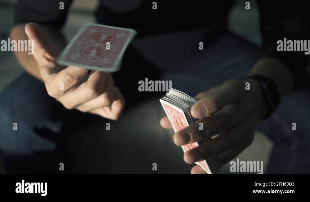The map rotates on the finger. manipulation with a deck of cards. The ...