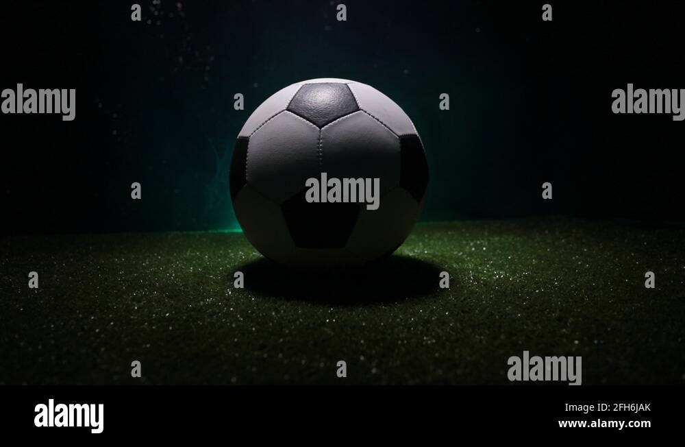 Slider shot. Traditional soccer ball on soccer field Stock Video ...