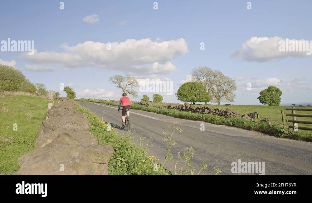 Country road cyclist Stock Videos & Footage - HD and 4K Video Clips - Alamy