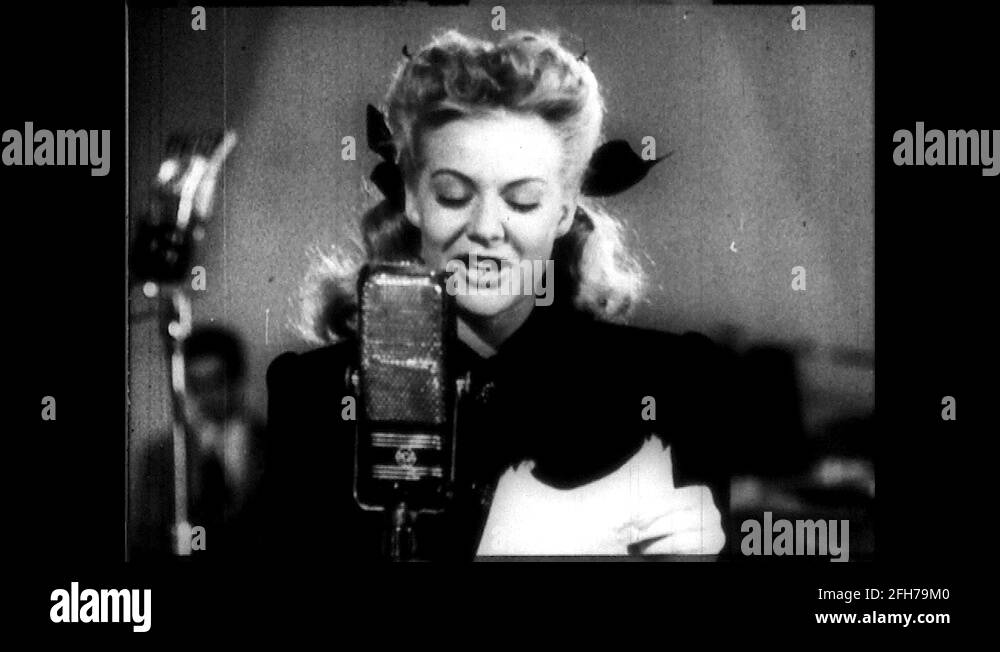 1940s: Bob Hope and Betty Hutton stand at microphones, crack jokes ...