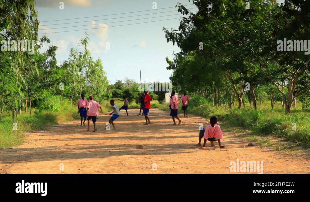 Boys playing during recess at school in a village in Kenya Stock Video ...
