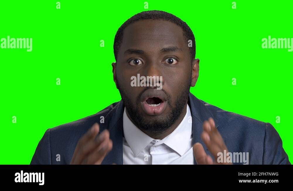 Face of shocked man on green screen Stock Video Footage - Alamy