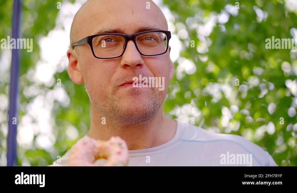 Man bitting Stock Videos & Footage - HD and 4K Video Clips - Alamy