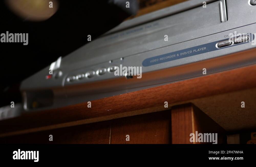 Inserting a VHS Tape into VHS player - normal style Stock Video Footage ...