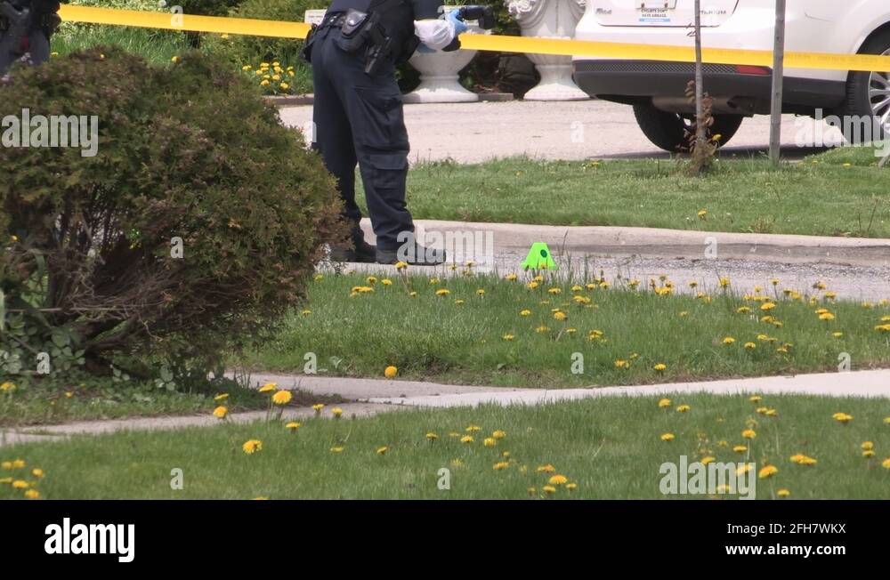 Police homicide officers at shooting murder scene Stock Video Footage ...