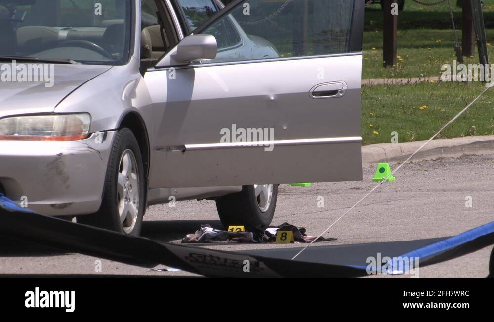 Police homicide officers at shooting murder scene Stock Video Footage ...