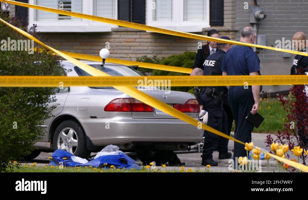 Police homicide officers at shooting murder scene Stock Video Footage ...