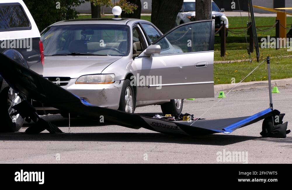 Police homicide officers at shooting murder scene Stock Video Footage ...