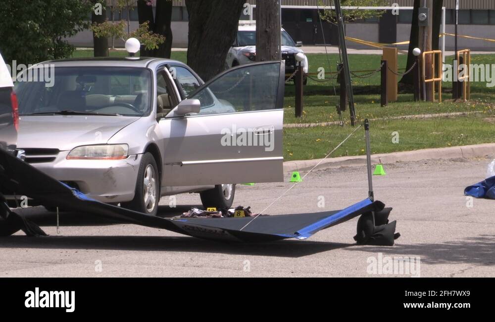 Police homicide officers at shooting murder scene Stock Video Footage ...