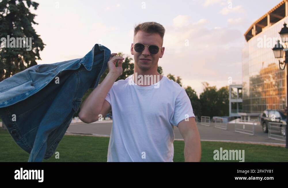 Jacket over shoulder Stock Videos & Footage - HD and 4K Video Clips - Alamy