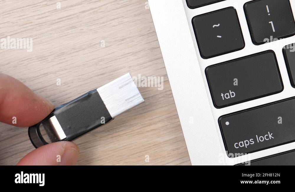 Plugging usb stick Stock Videos & Footage - HD and 4K Video Clips - Alamy