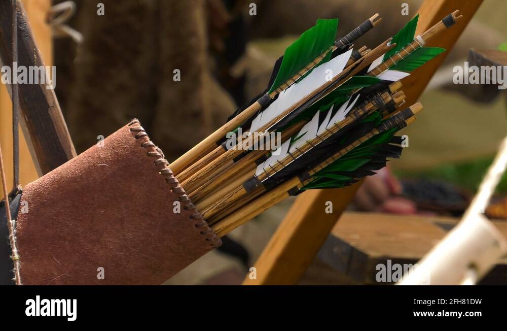 arrows in a quiver medieval men in the background 4k slow motion Stock ...
