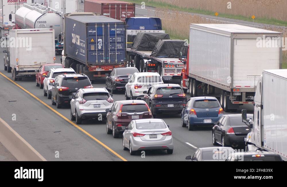 Epic traffic car truck traffic jam gridlock on highway in Toronto ...