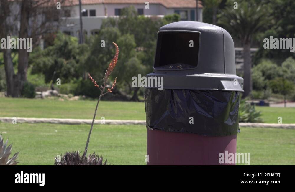 Trash can outside Stock Videos & Footage - HD and 4K Video Clips - Alamy
