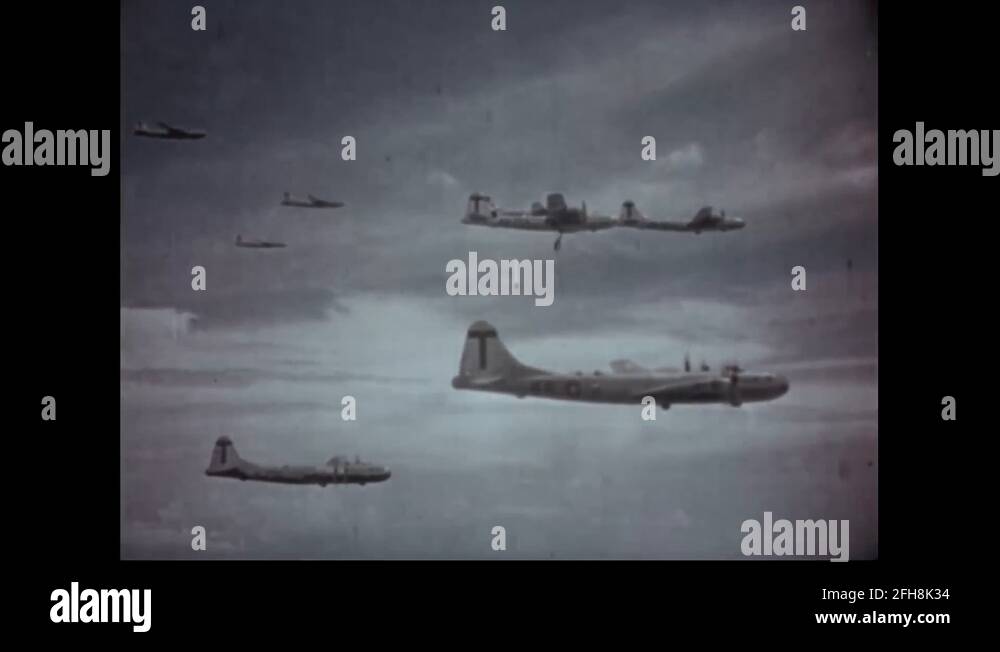 WW2 - US bomber fleet fly in a formation Stock Video Footage - Alamy