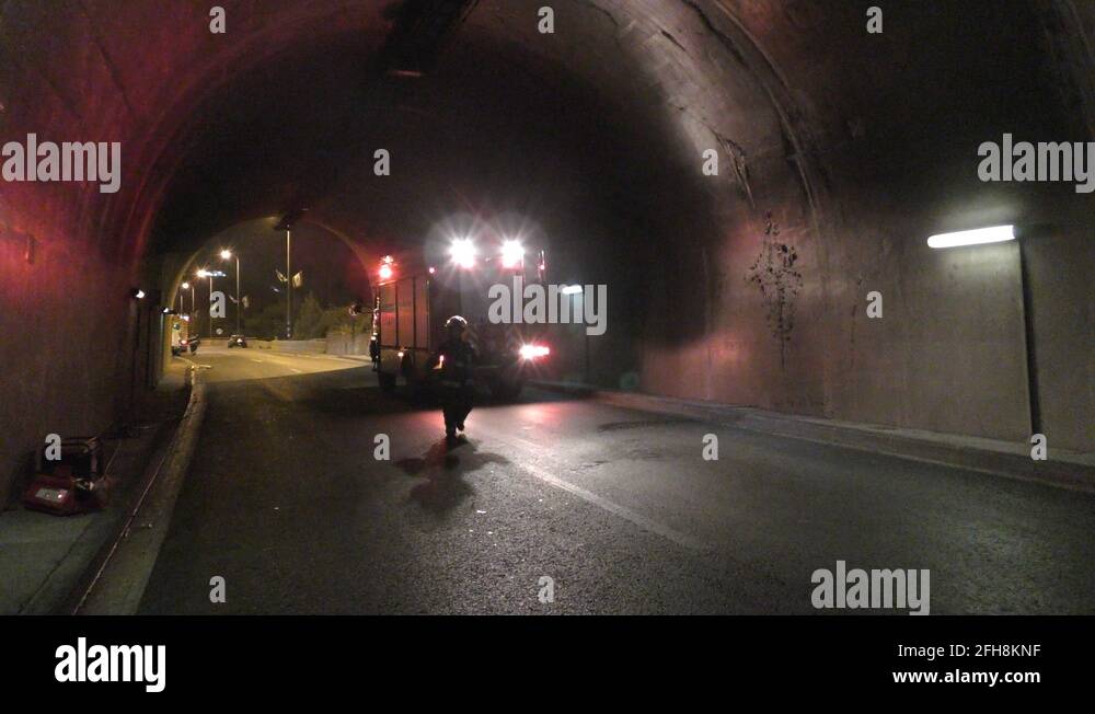 Fire engine enters the tunnel to start a rescue during a drill in Ixal ...