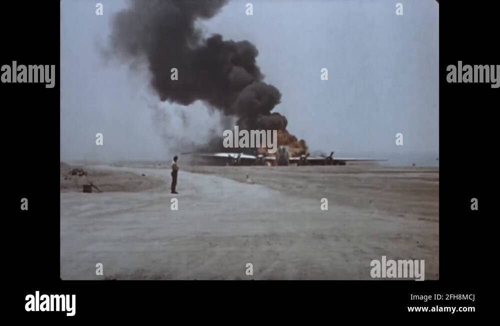 WW2 - Burning US Bomber on a airfield Stock Video Footage - Alamy