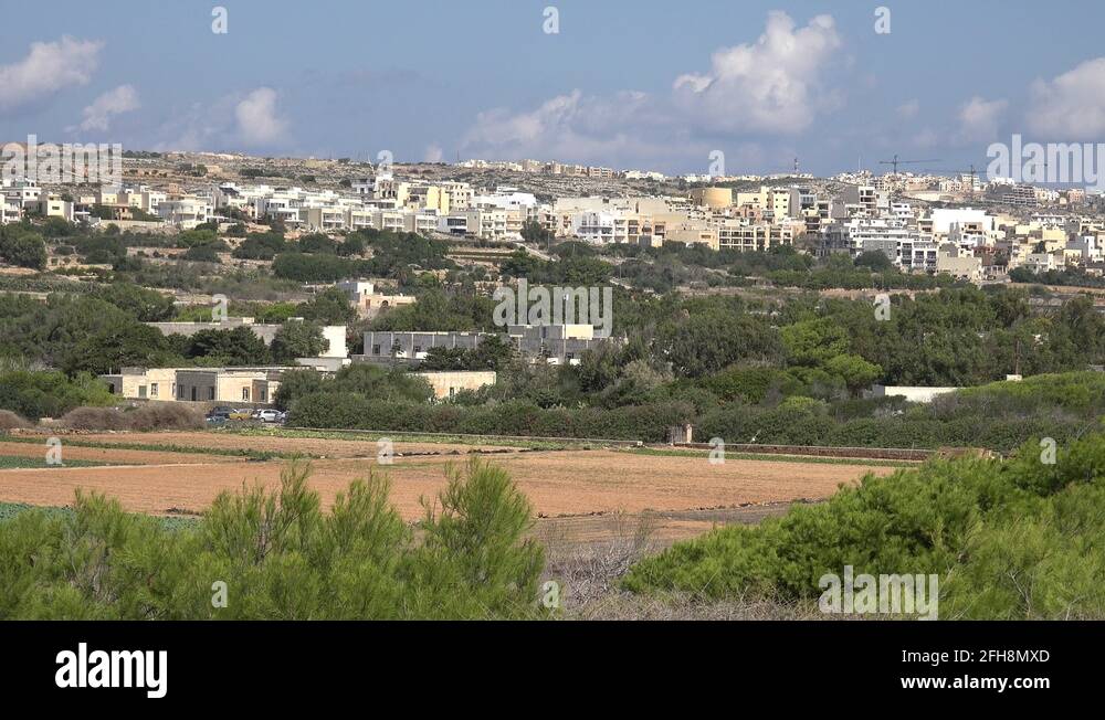 4K Malta rural area viewpoint in hot summer day arid vegetation ...