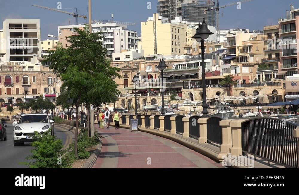 4K Traffic car street in Malta busy bay tourism attraction in summer ...