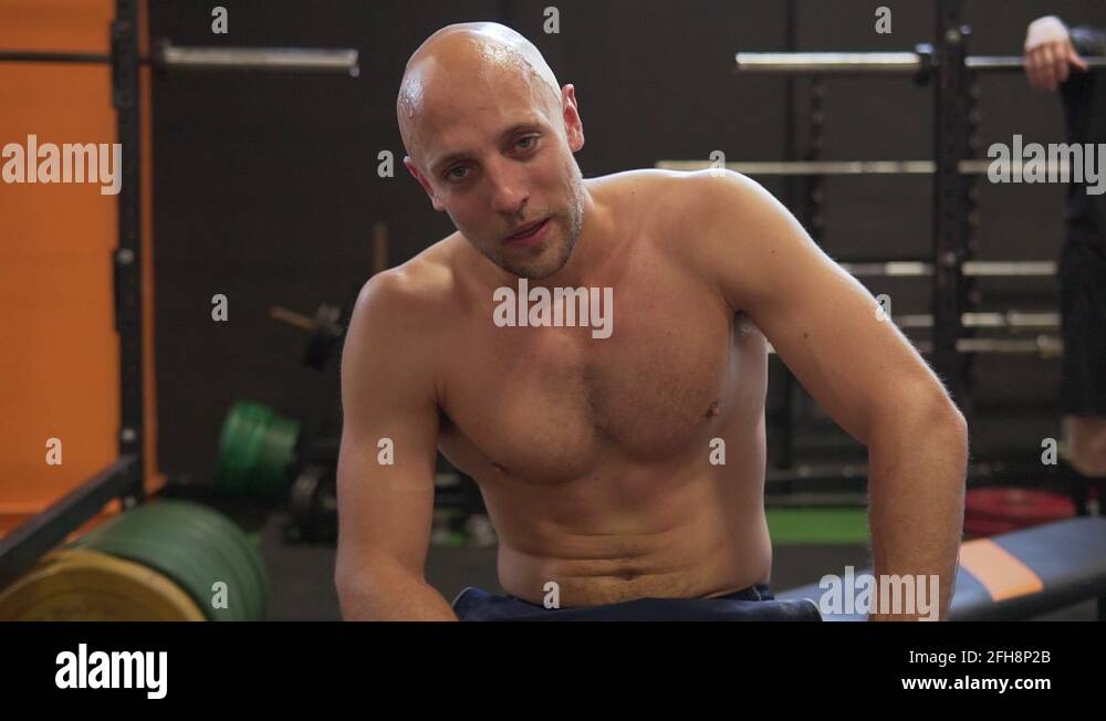 Fitness man smiling and showing palms with bloody calluses in gym Stock ...