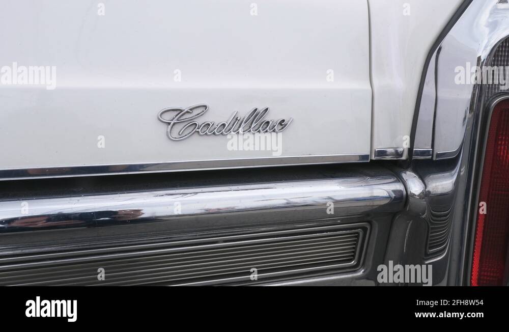 Cadillac script logo on old white Cadillac de Ville car Stock Video ...