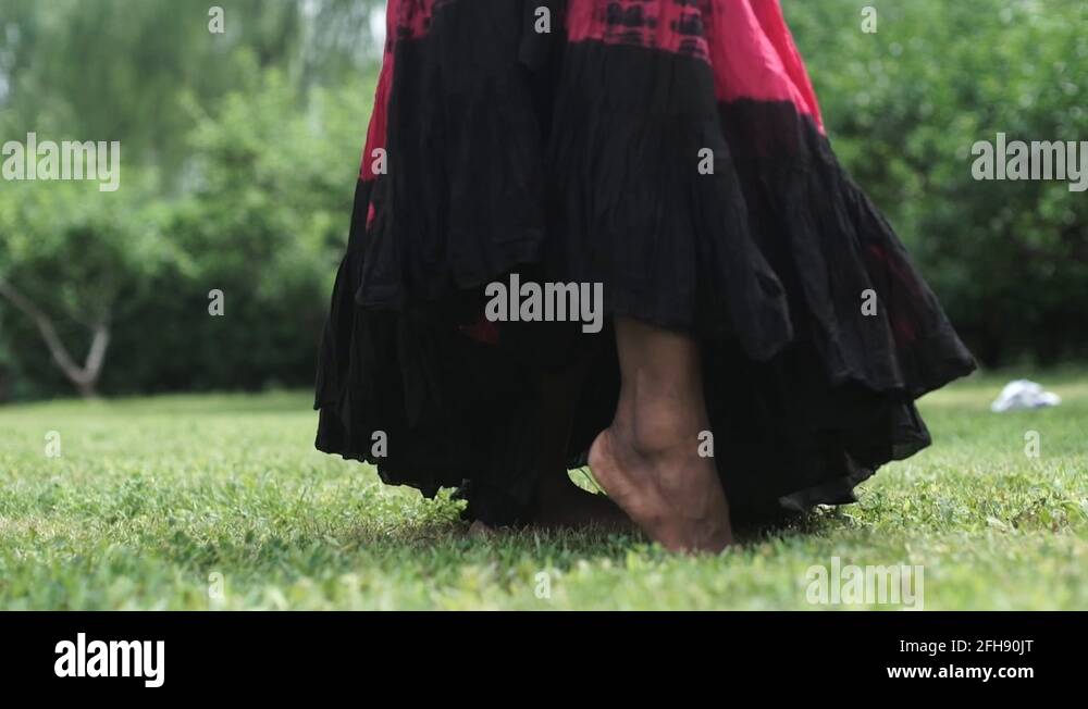 african women dancing a folk dance in traditional costumes and sing ...
