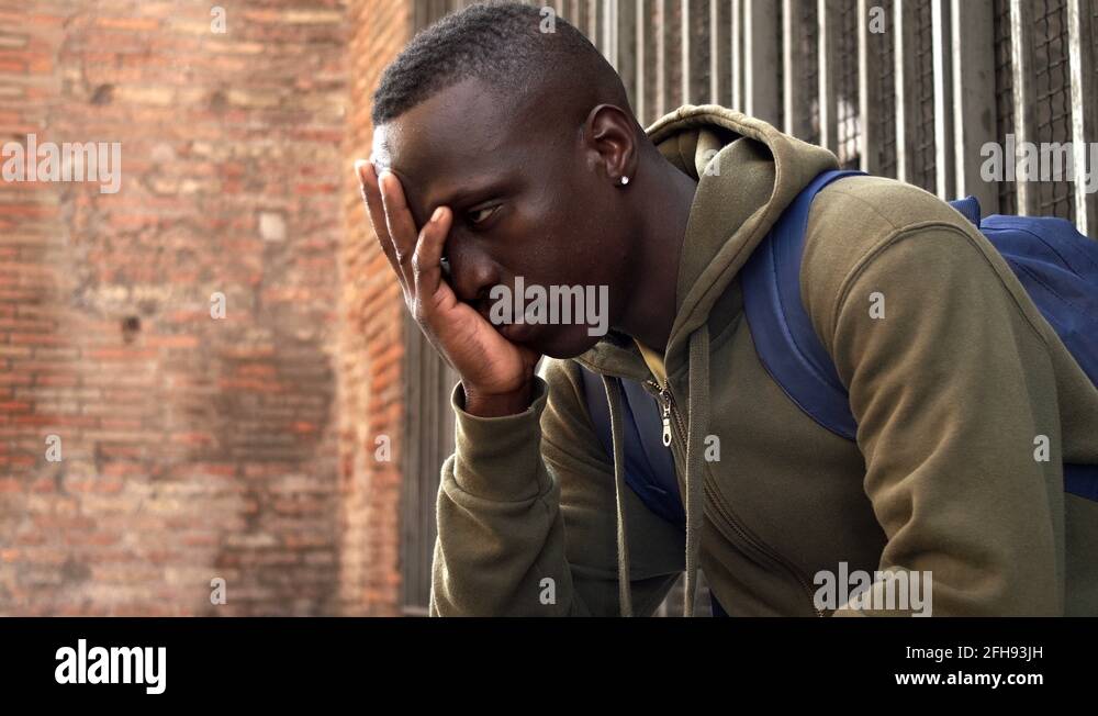 Depressed sad young black african student- outdoor Stock Video Footage ...