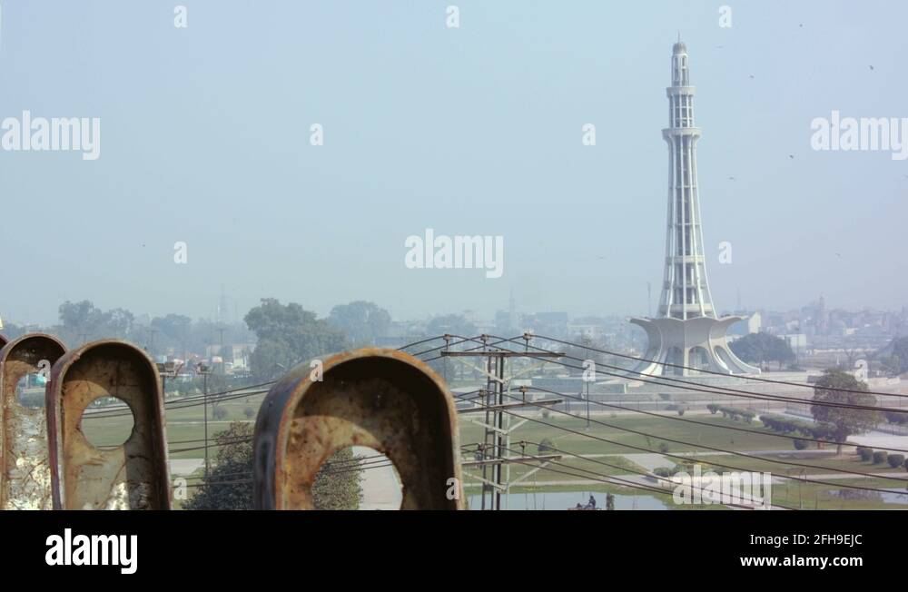 Telephoto shot of Minar-e-Pakistan, tower reflects a blend of Islamic ...