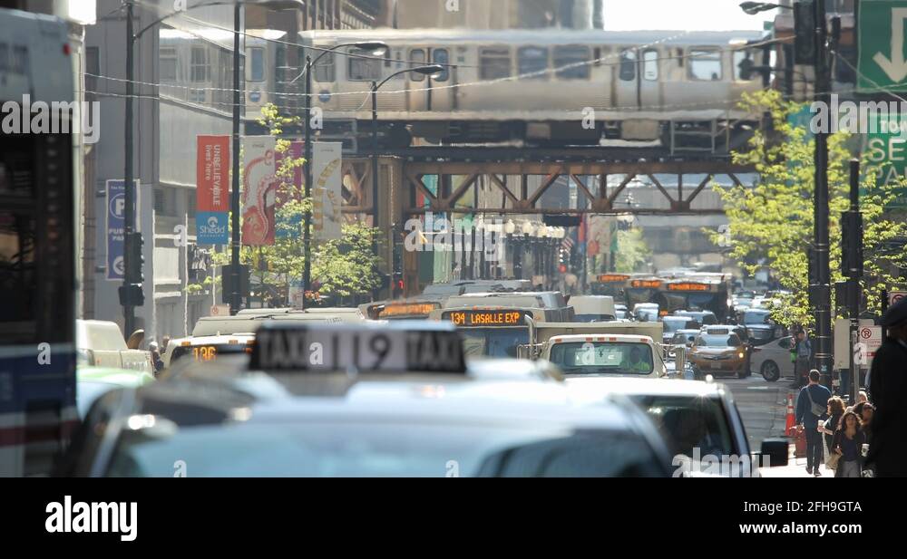 Chicago downtown commuter crowd of people walking street traffic train ...
