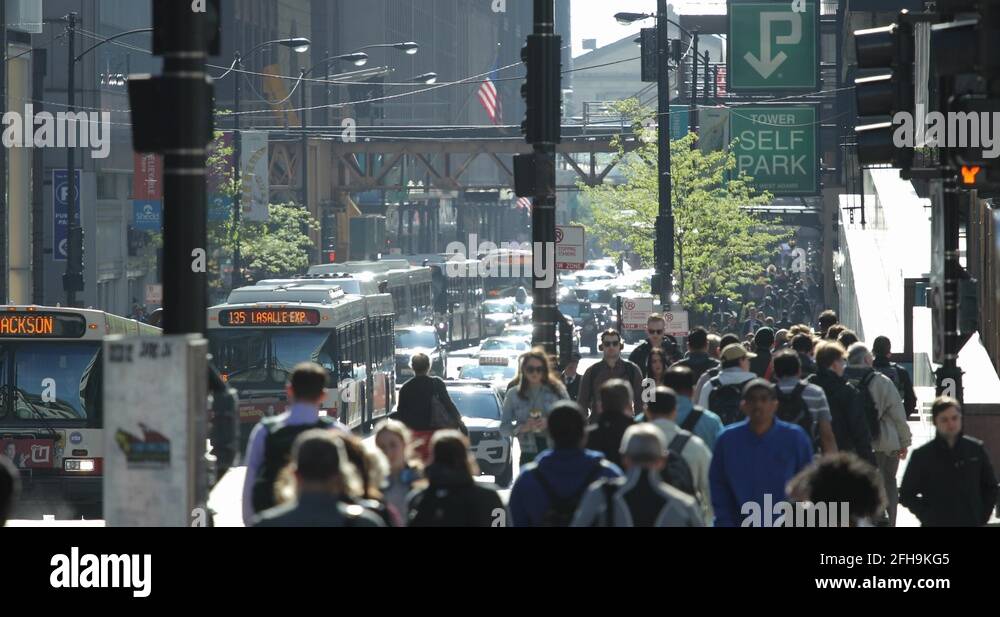 Crowd of commuter people walking street to work backlit silhouette ...
