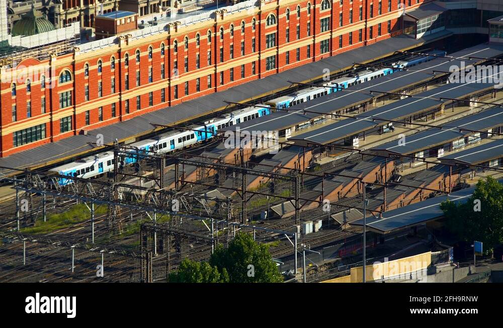 Passenger trains at station platforms Flinders Street Melbourne Stock ...