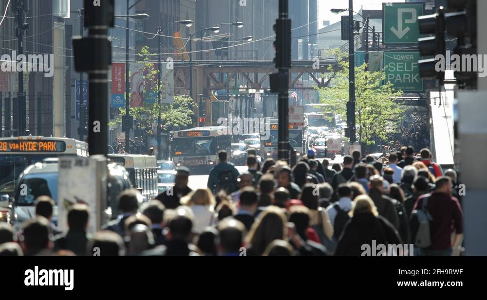 Crowd of commuter people walking street to work backlit silhouette ...