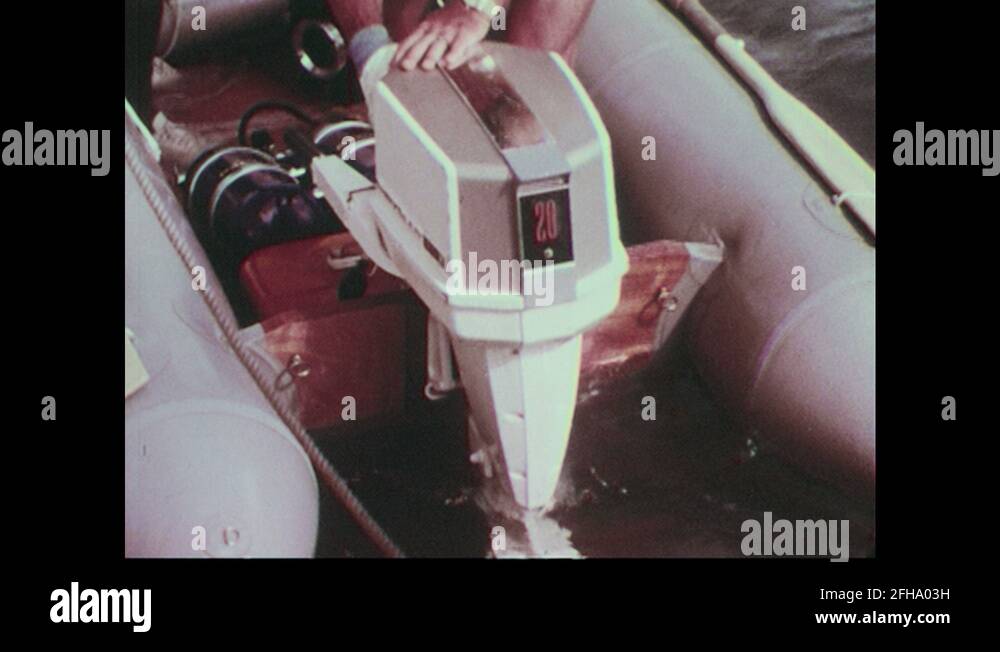 1960s: Outboard motor starts and dinghy heads out to open water with ...