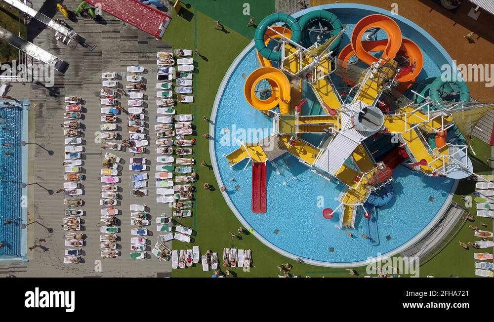 summer day cityscape waterpark swimming pool aerial down view panorama ...