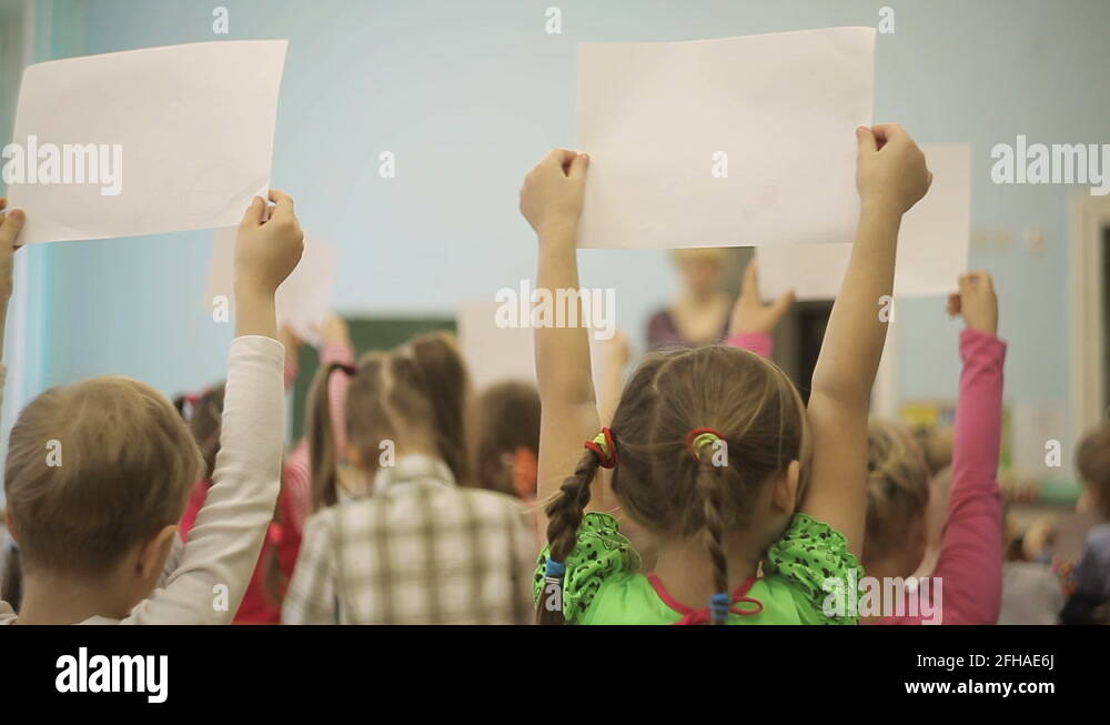 Children holding hands in classroom Stock Videos & Footage - HD and 4K ...