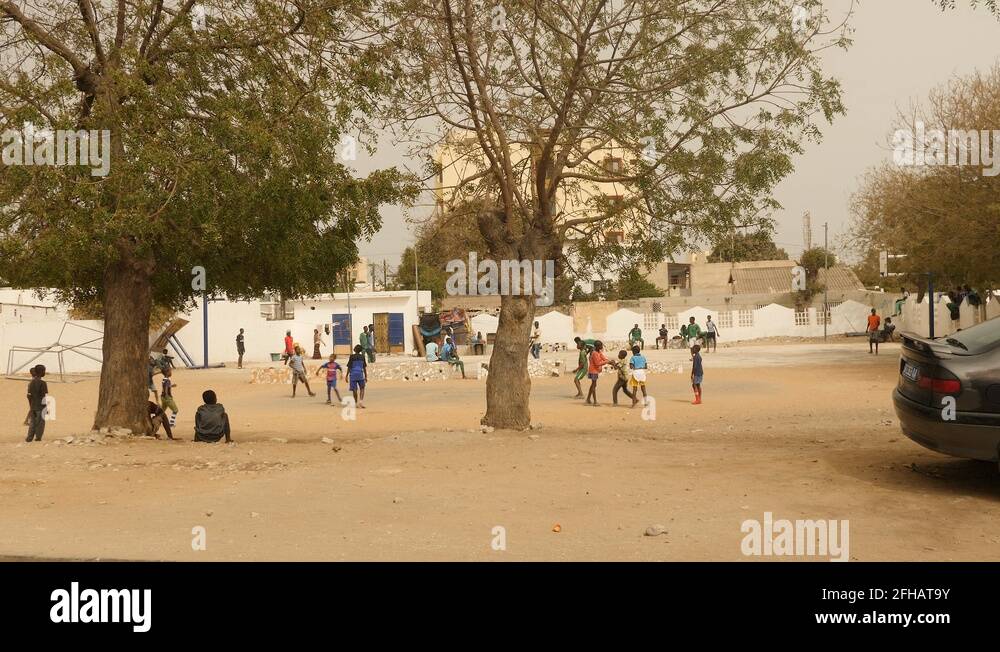 Kids playing soccer street Stock Videos & Footage - HD and 4K Video ...