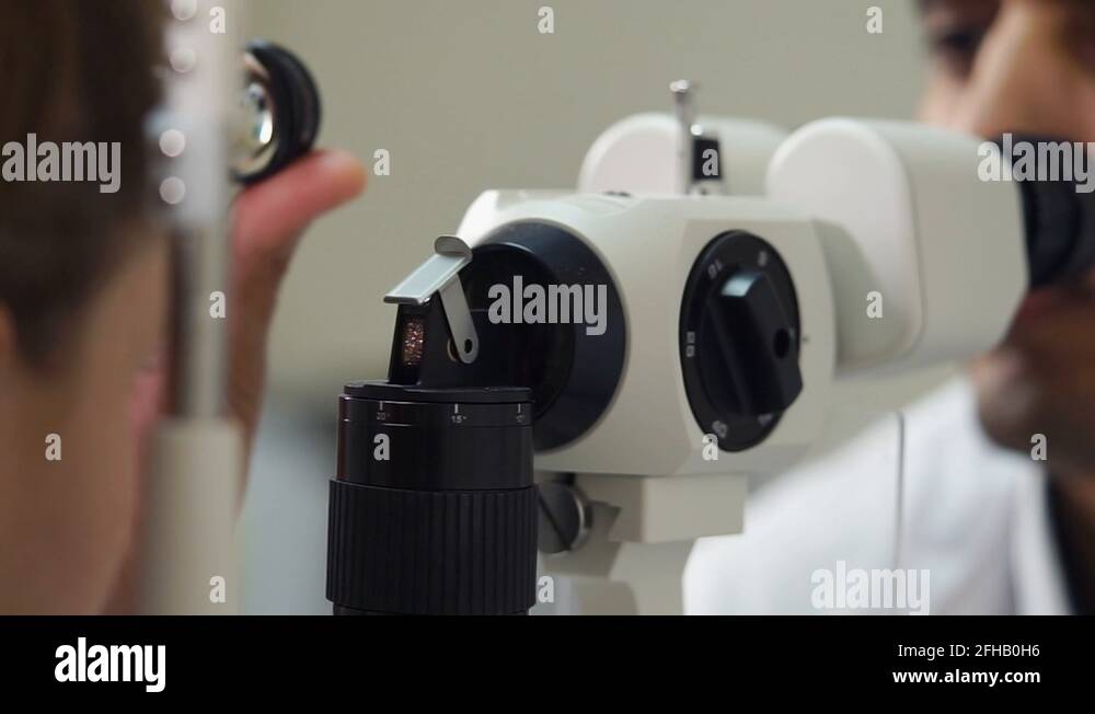 Female patient on a procedure of biomicroscopy of eye, close-up Stock ...