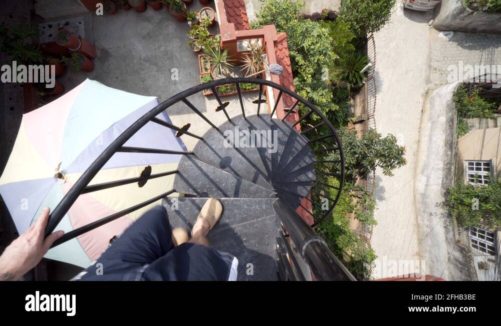 Man walking down spiral staircase Stock Videos & Footage - HD and 4K ...