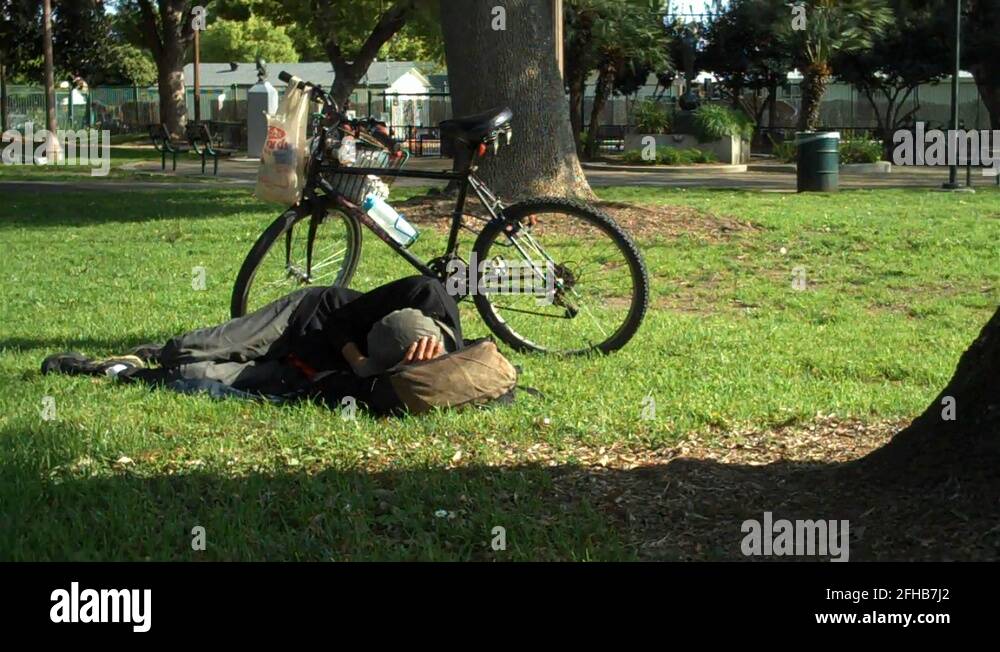 Homeless person sleeping Stock Videos & Footage - HD and 4K Video Clips ...