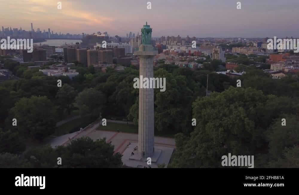 alt dusk flying counter clock around Fort Green Park monument reveals ...