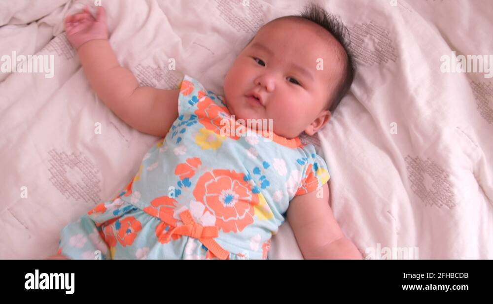 Baby dimple Stock Videos & Footage - HD and 4K Video Clips - Alamy