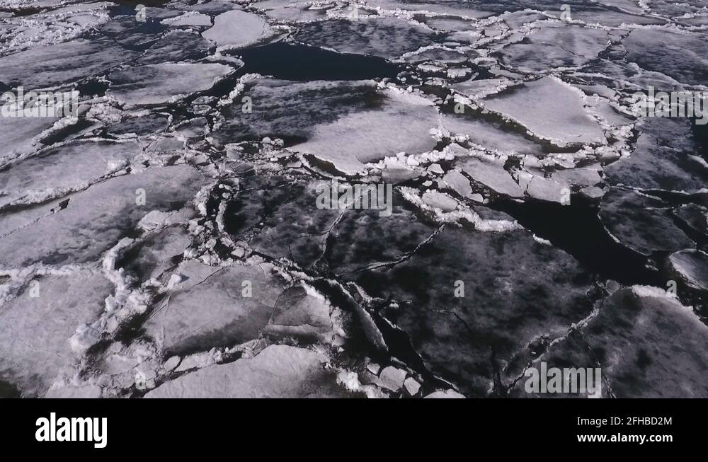 Ice blocks on the sea. Cracked ice texture. Top view. Nature winter ...