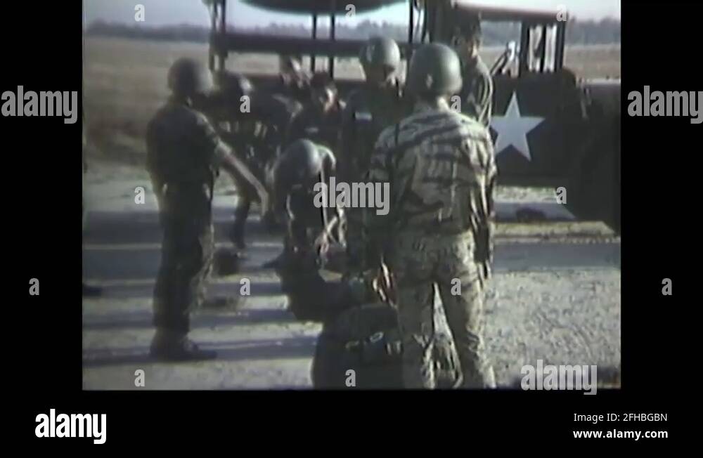Civilian Irregular Defense Group troops assemble on field - 1969 Stock ...