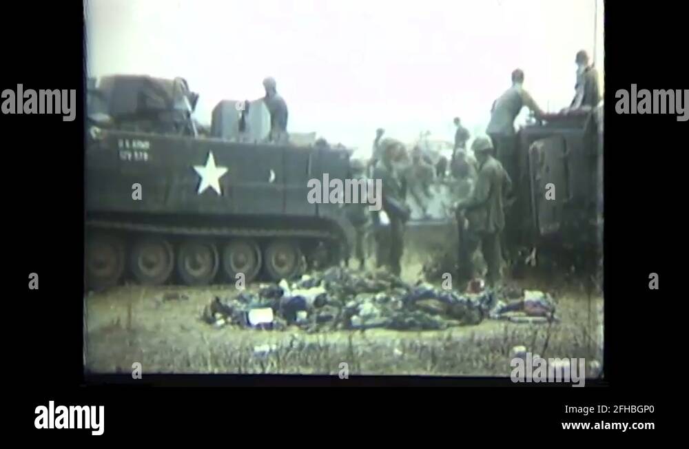 Pile of captured Vietcong weapons and dead Vietcong - 1968 Stock Video ...