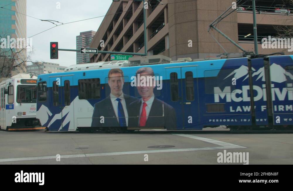 Lightrail Bus turning at intersection Stock Video Footage - Alamy