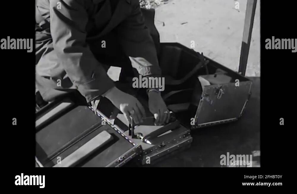 Korean soldier brings, unpacks and setting up projector - 1950 Stock ...