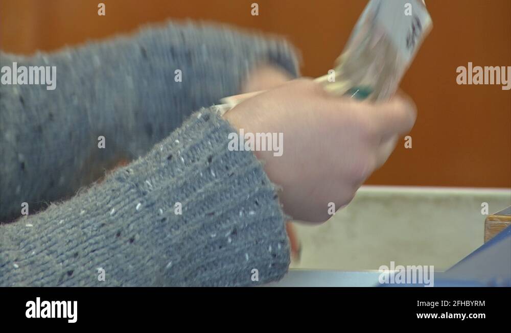 Female cash counter Stock Videos & Footage - HD and 4K Video Clips - Alamy