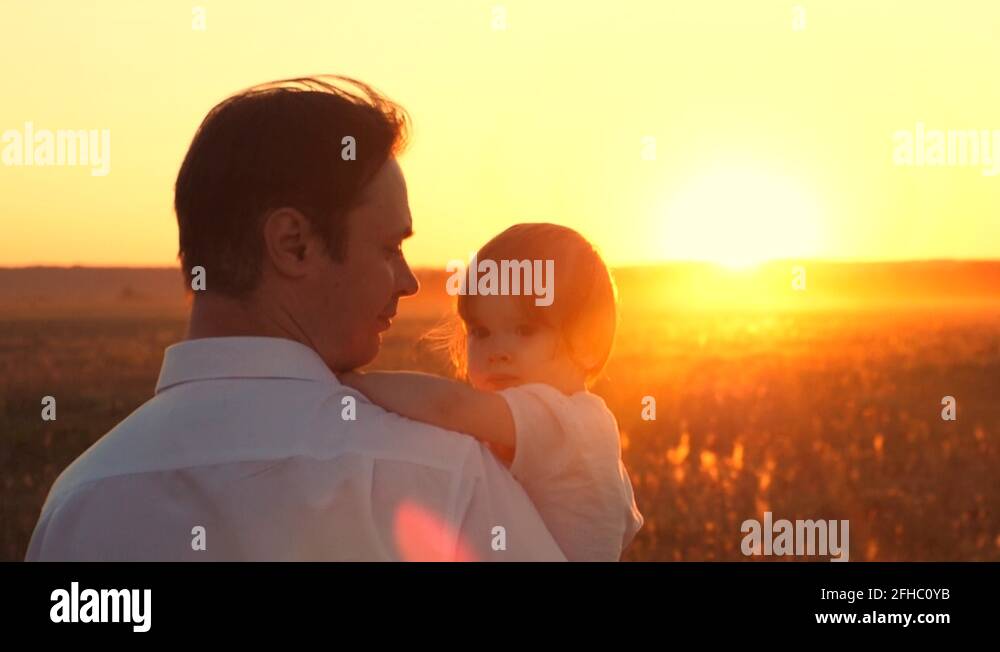 Father carries his child in arms Stock Videos & Footage - HD and 4K ...