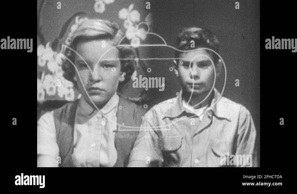 1950s: UNITED STATES: angry girl and boy. Steam rises inside animation ...
