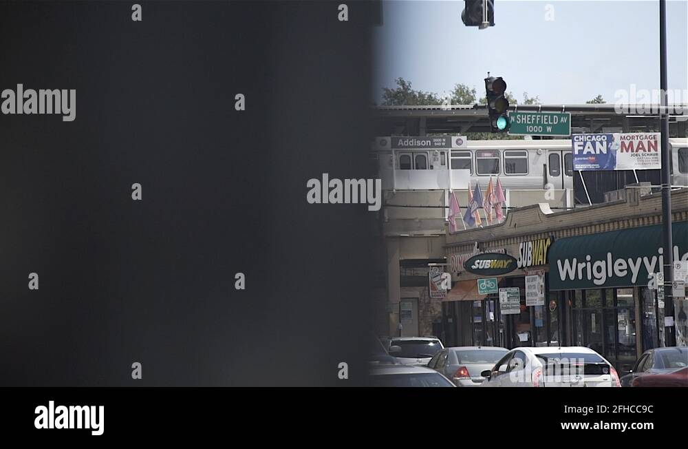 Addison Red Line Station, Train Moving next to the Cubs Wrigley Field ...